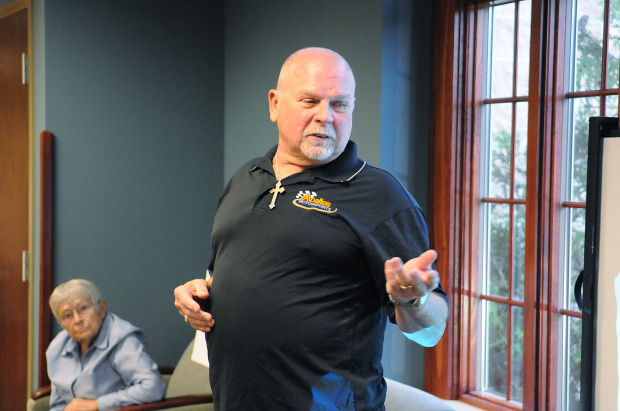 Masking the Pain - Herald-Standard